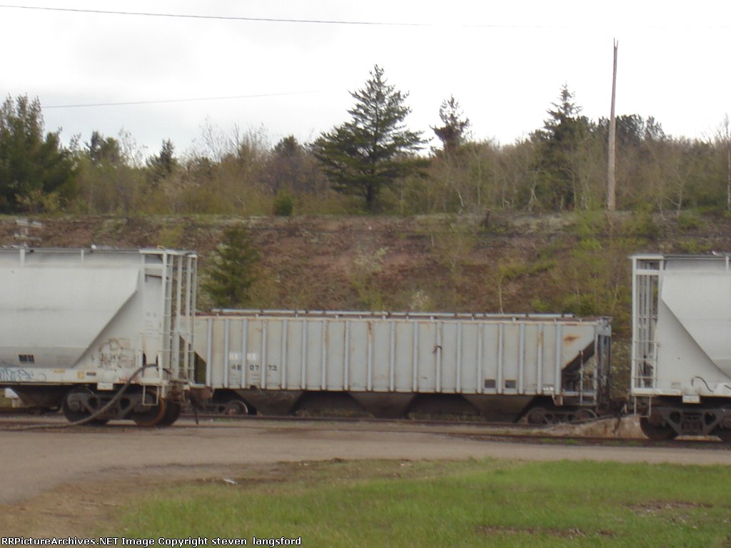 COVERED HOPPERS IN THE YARD